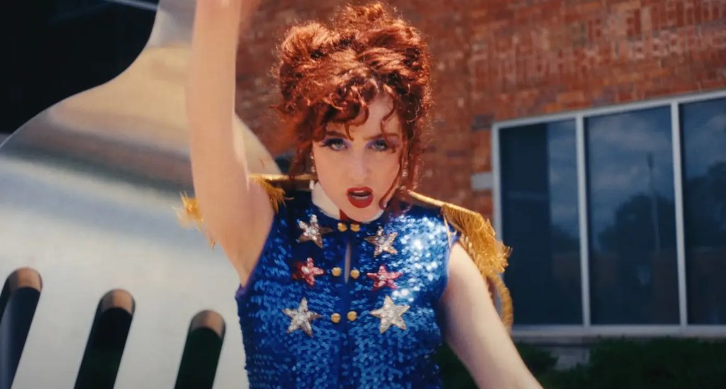 Fiery redhead Chappell Roan believes she would be 'way bigger' if she 'wore a muzzle' after ...