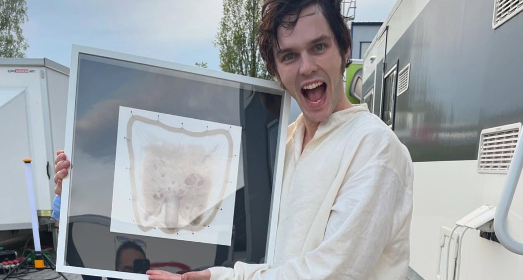 Nicholas Hoult proudly has Bill Skarsgård's 'raw pork sausage' framed at home